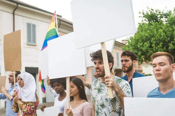 Activists demonstrating against social issues - Stock Image - Everypixel