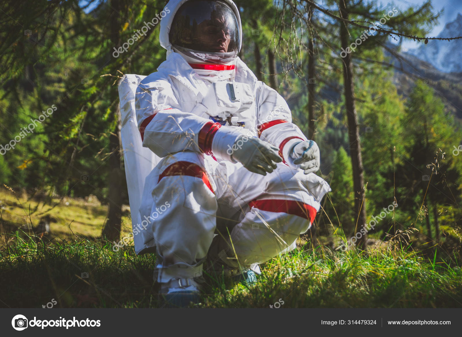 Astronaut exploring a new planet. Searching for a new home for h Stock ...