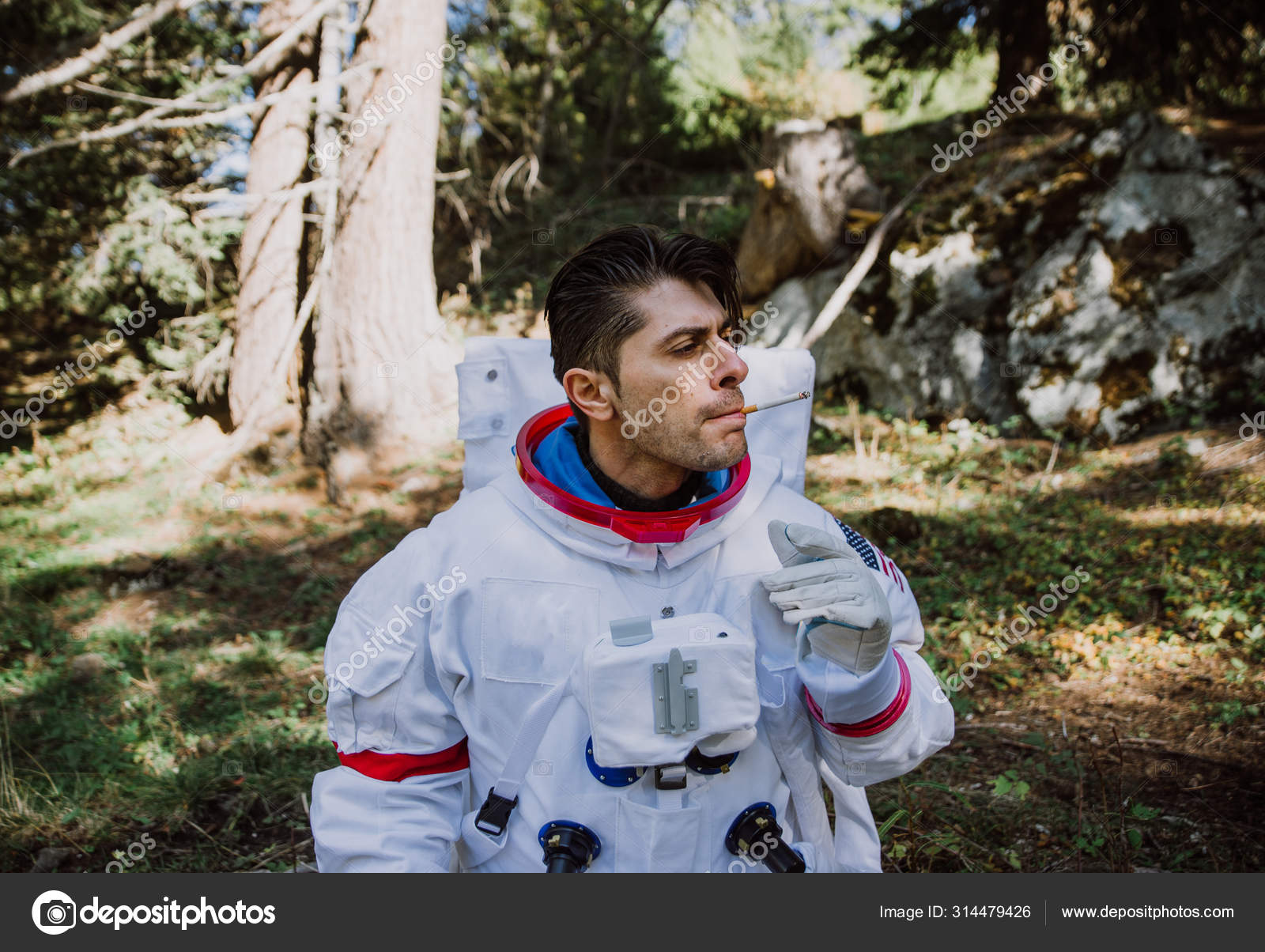 Astronaut exploring a new planet. Searching for a new home for h Stock ...