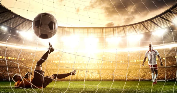 Intense soccer moment in front of the goal on the professional soccer ...