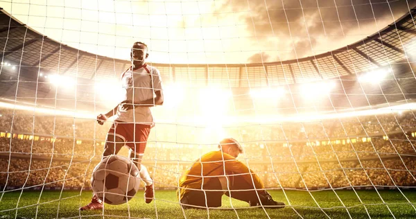 Intense soccer moment in front of the goal on the professional soccer ...