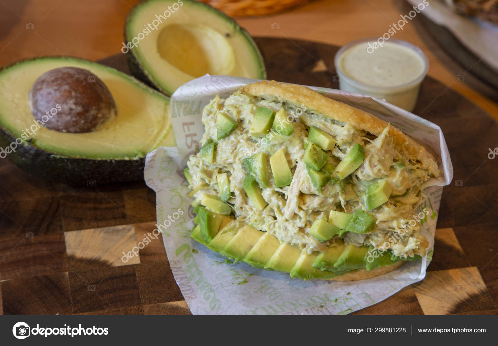 Queen Arepa, corn bread with chicken and avocado Stock Photo by ...