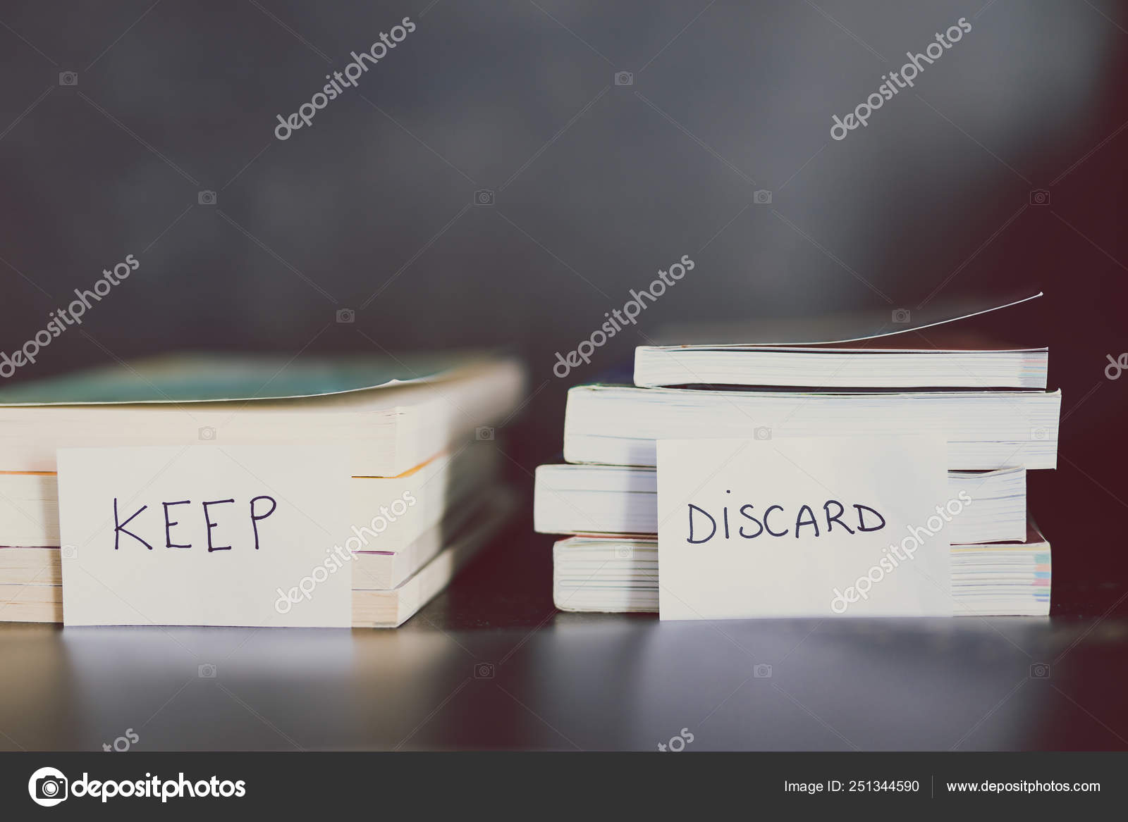 Selecting which books to keep and which to discard or donate, de ...