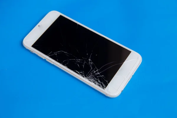 Broken mobile phone. Cracked smartphone screen - Stock Image - Everypixel