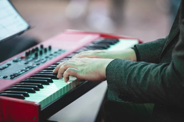 Concert view of a musical keyboard piano player during musical jazz ...