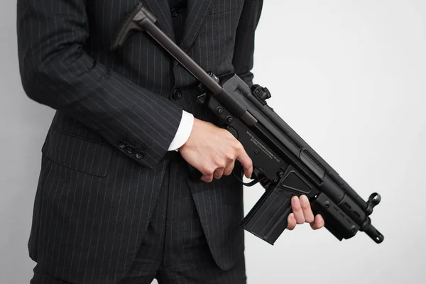 Man in suit with gun Stock Photos, Royalty Free Man in suit with gun ...