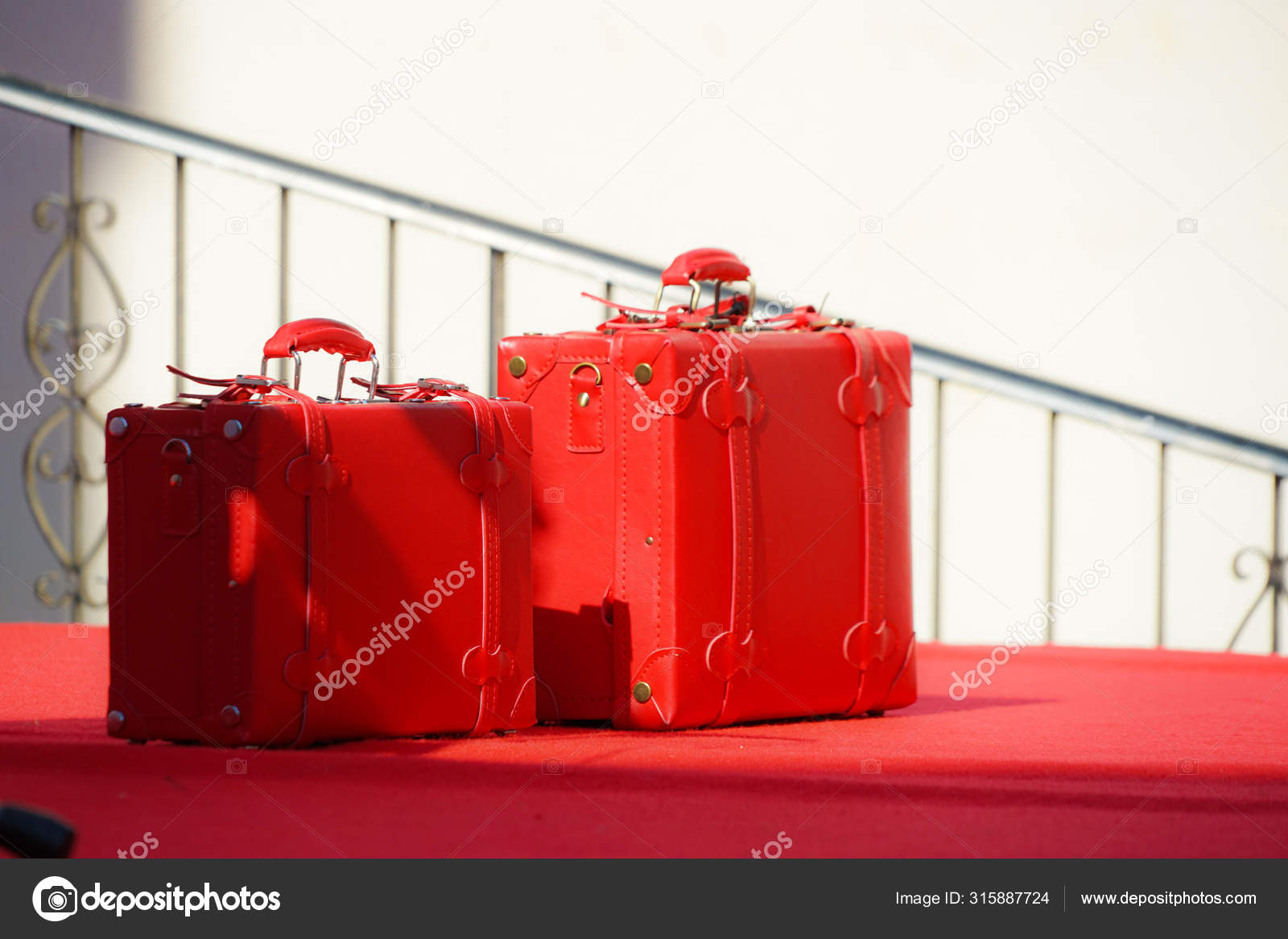Image Two Red Suitcases — Stock Photo © kanzilyou #315887724