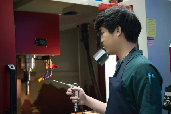 Mechanical engineer working at the plant of machine tools,Asian Lathe ...