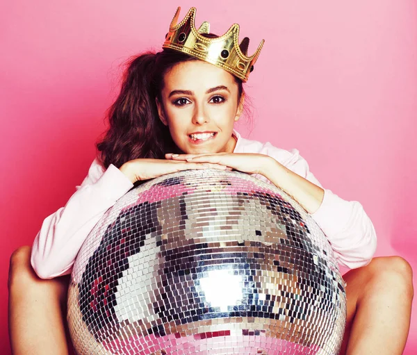 Young cute disco girl on pink background with disco ball and cro Stock ...