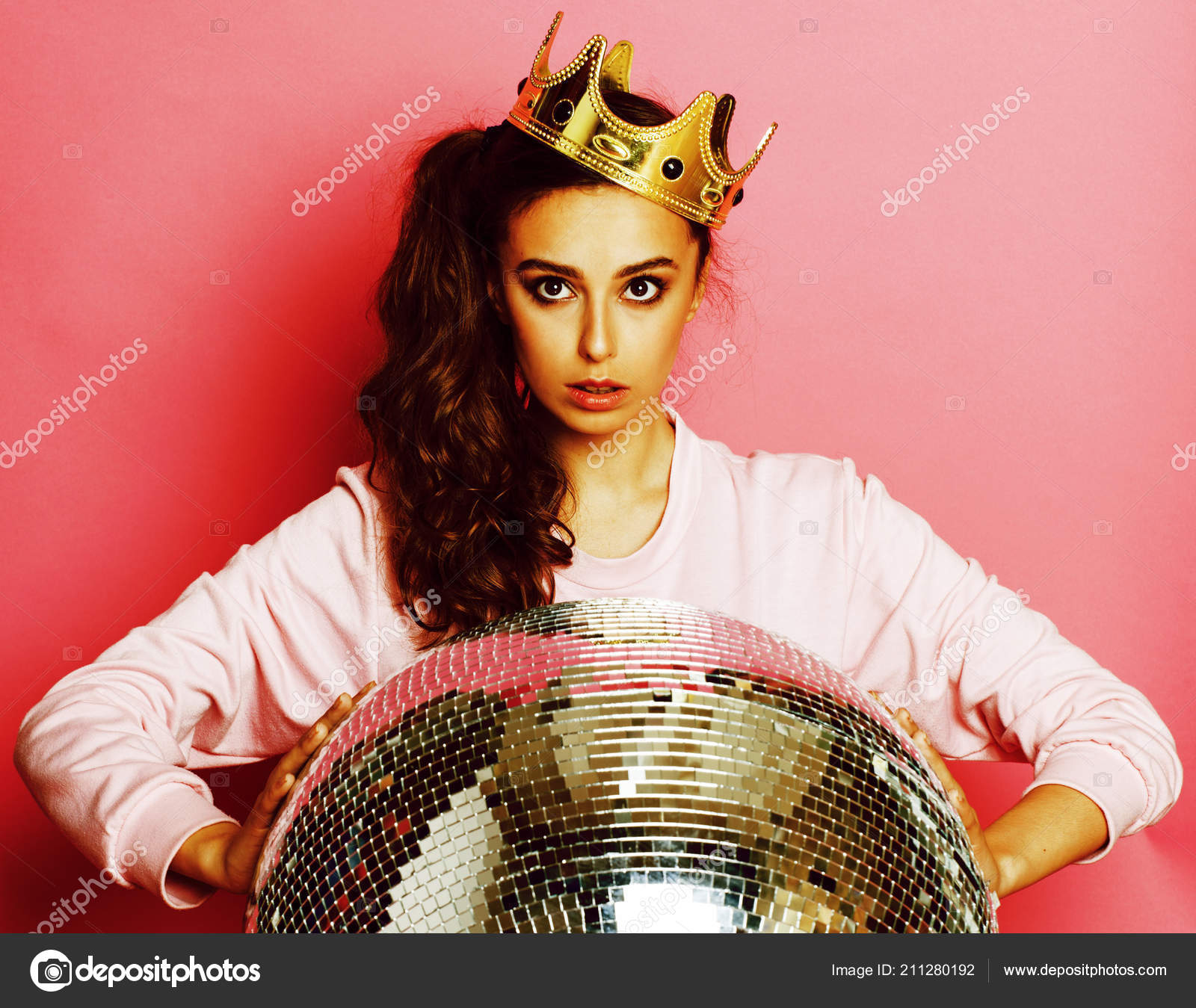 Young cute disco girl on pink background with disco ball and cro Stock ...