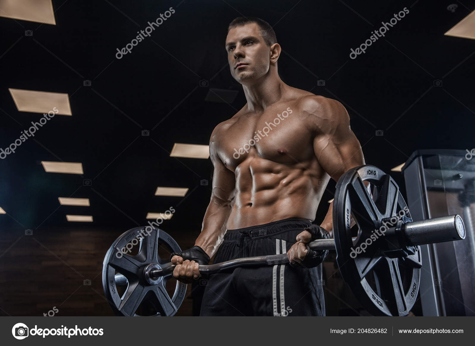 Man Trains Gym Training Biceps Barbell Stock Photo by ©roman.l.olegovic ...
