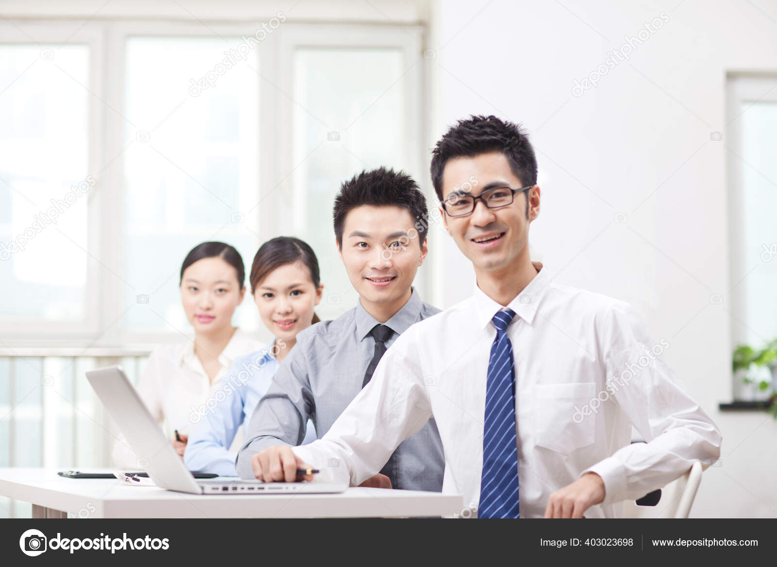 Executives Sitting Conference Table — Stock Photo © eastfenceimage ...