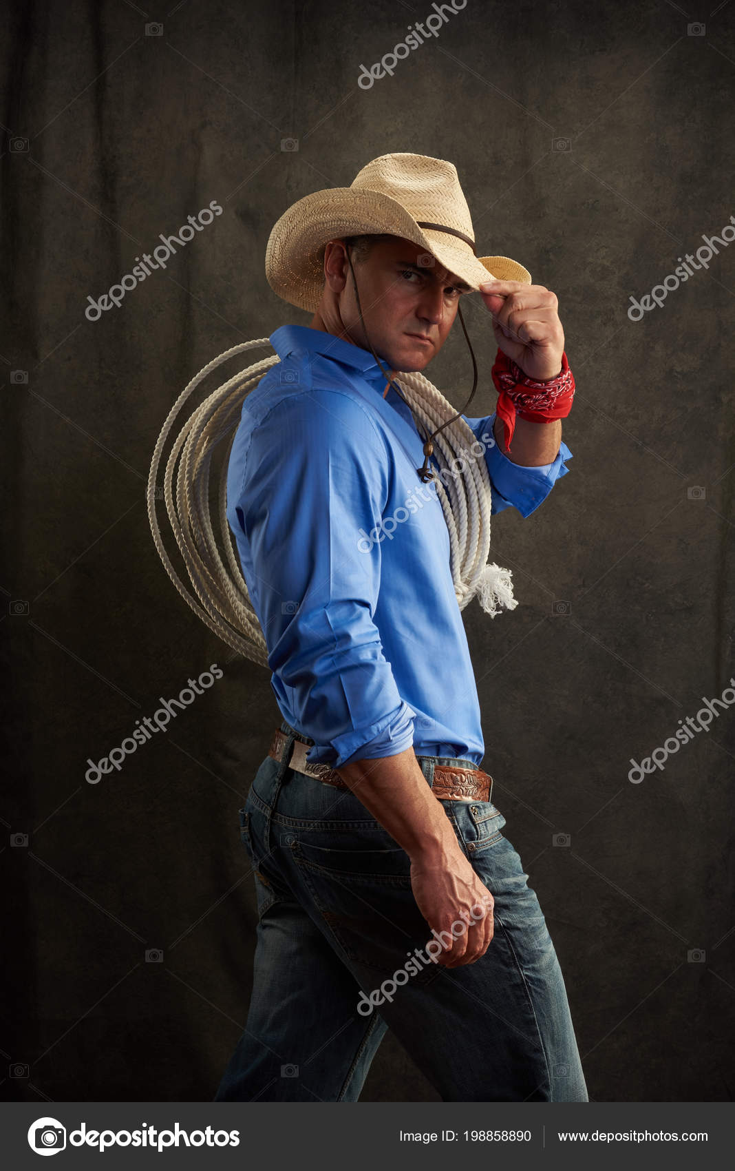 Sexy Cowboy Poses Camera — Stock Photo © romancephotos #198858890