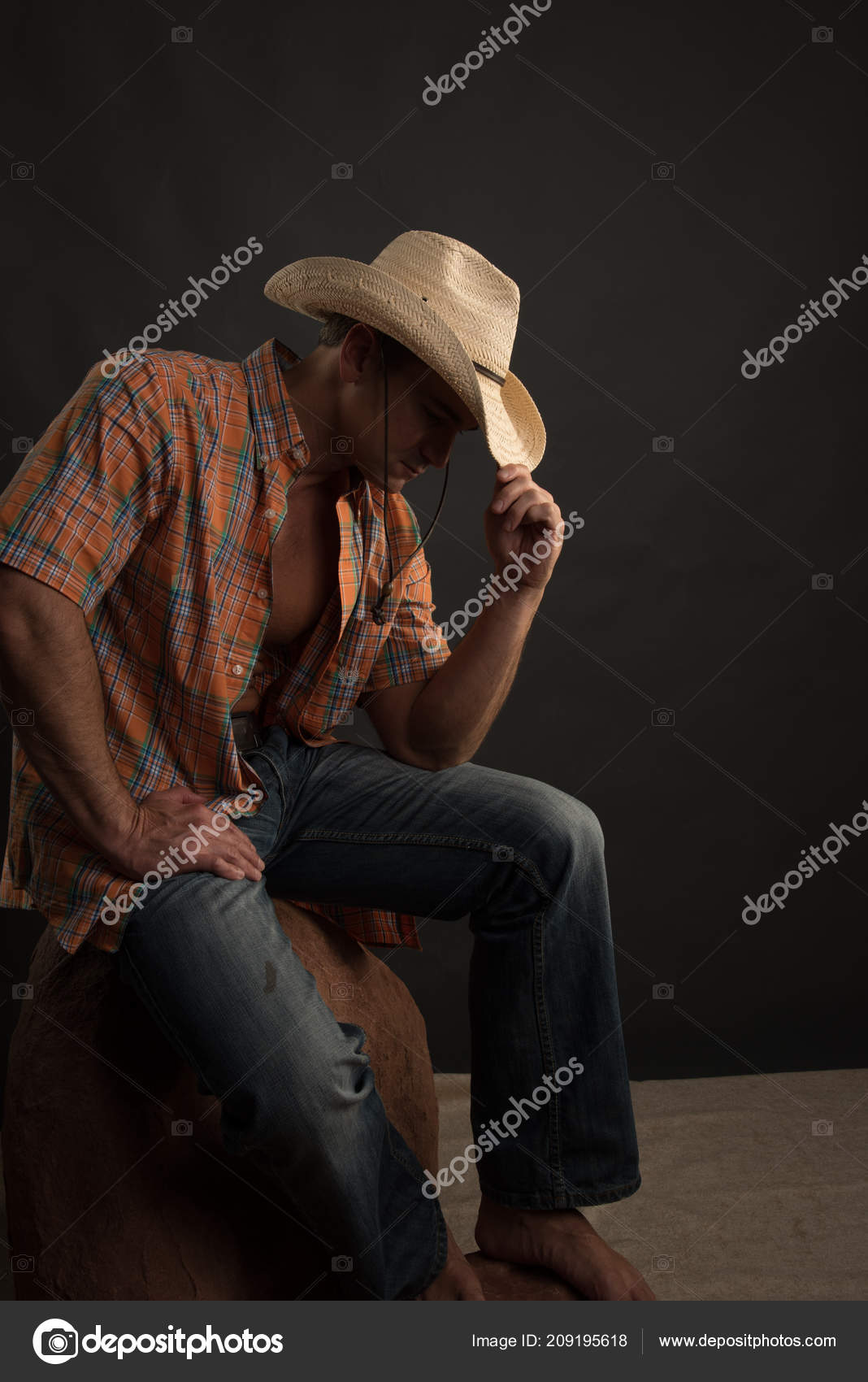 Handsome Rancher Poses Camera — Stock Photo © romancephotos #209195618