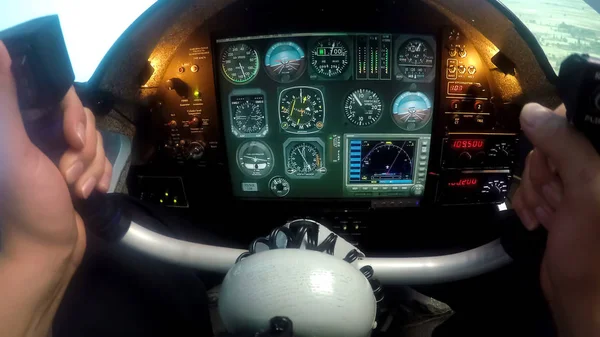 Male hands controlling flight simulator, beginner pilot practicing at ...