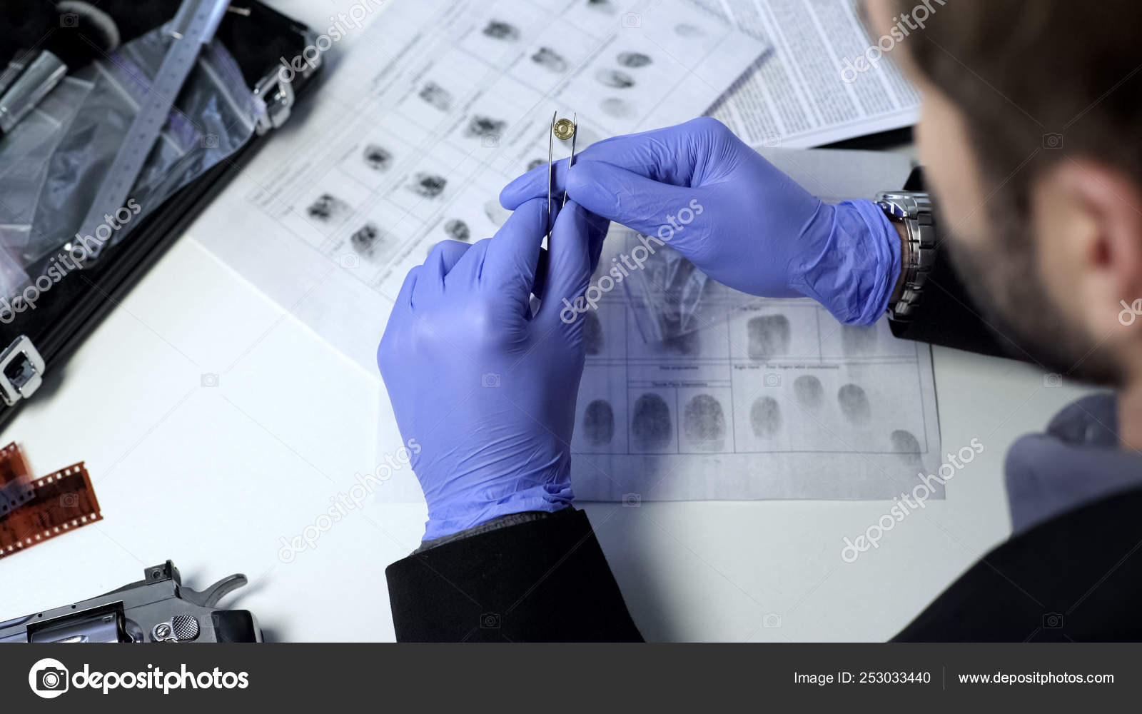 Private Detective Checking Fingerprints Bullet Using Tweezers ...