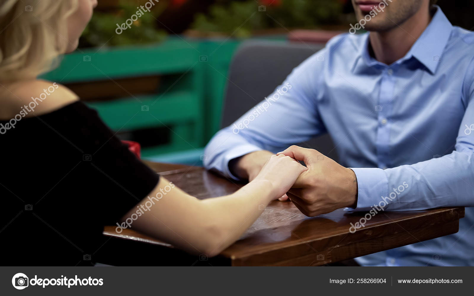 Handsome Man Confessing His Love Beautiful Girlfriend Holding Her Hand ...