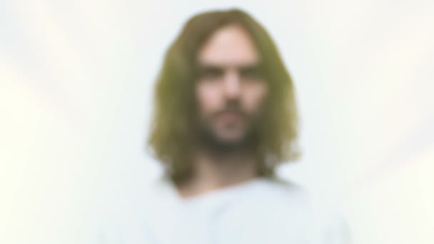 Jesus Christ looking into camera on isolated bright background ...