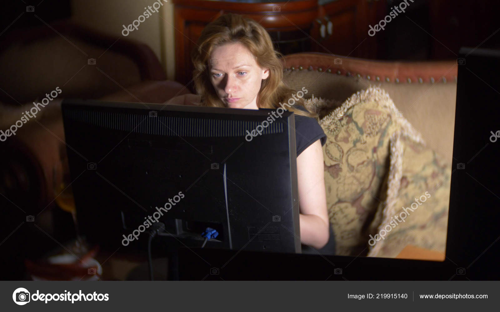 Woman with computer, drinking beer at home in the dark. — Stock Photo ...