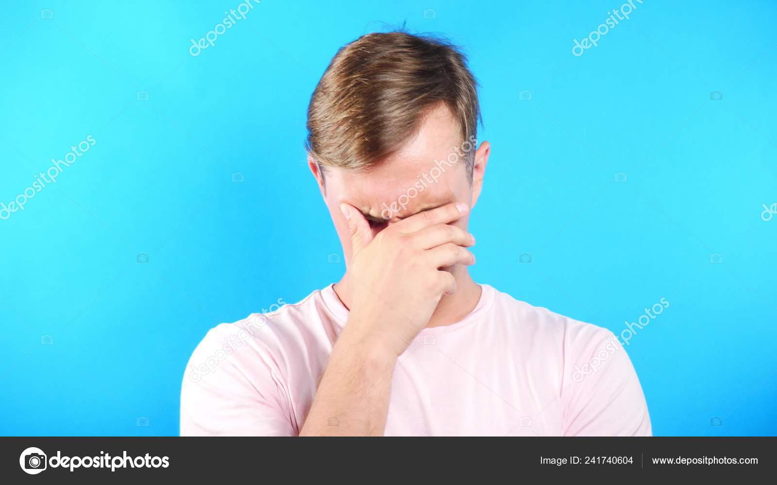 Young man on color blue background. portrait. emotions and gestures ...