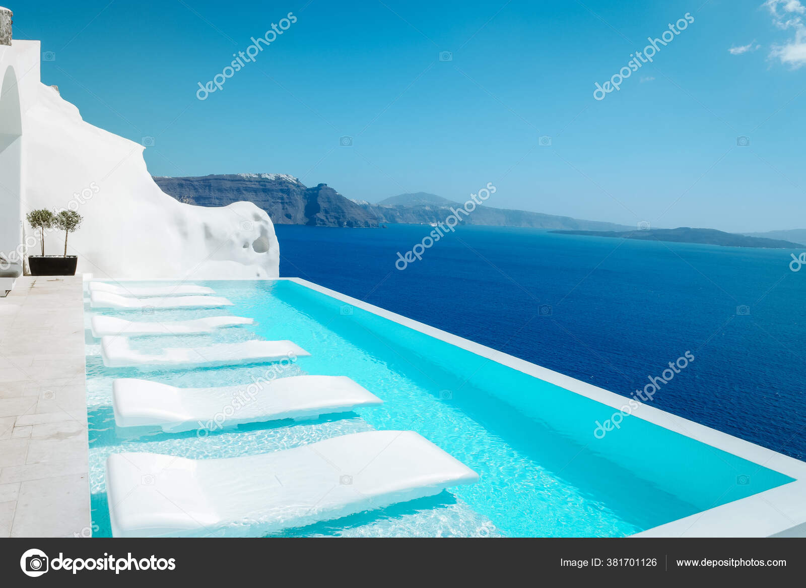 Infinity pool Santorini Greece looking out over the caldera of the ... Infinity pool Santorini Greece looking out over the caldera of the ...