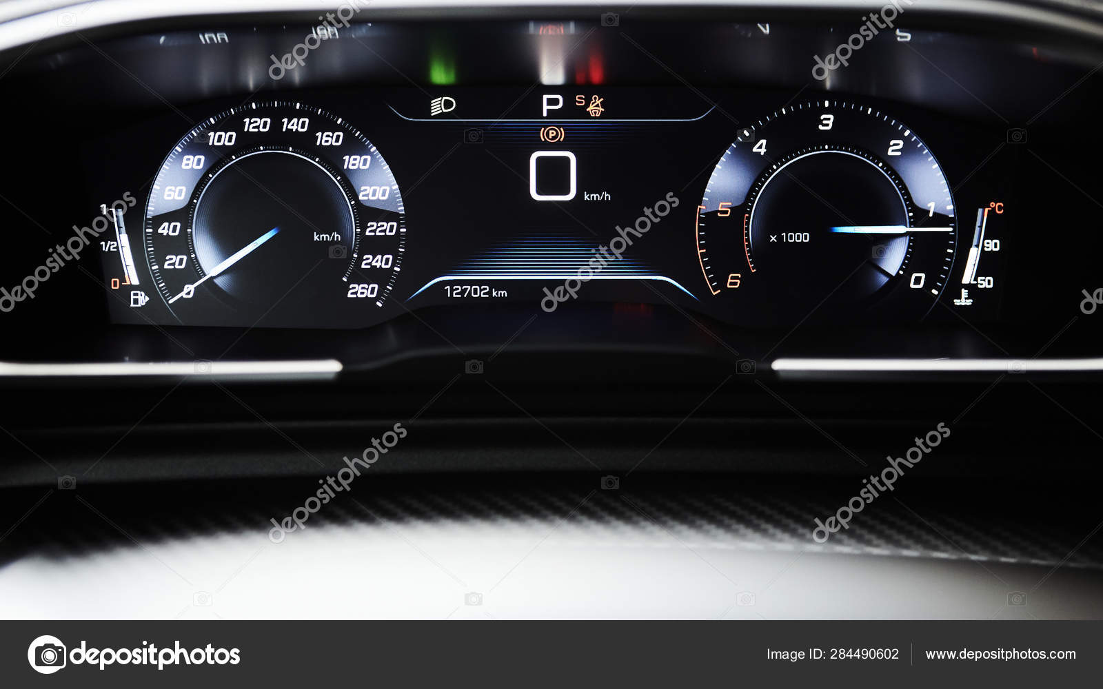 Car dashboard panel with speedometer, tachometer, odometer, fuel gauge ...
