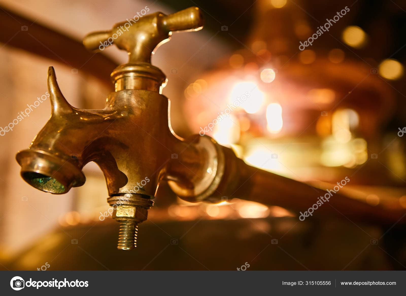 Detalis of medieval traditional distiller cube made from copper ...