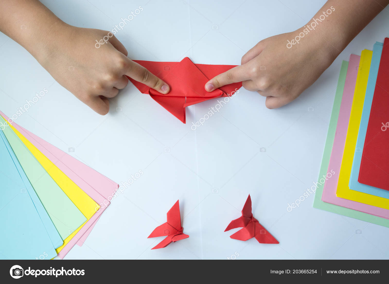 Children's Hands Origami Butterfly Colored Paper White Background ...
