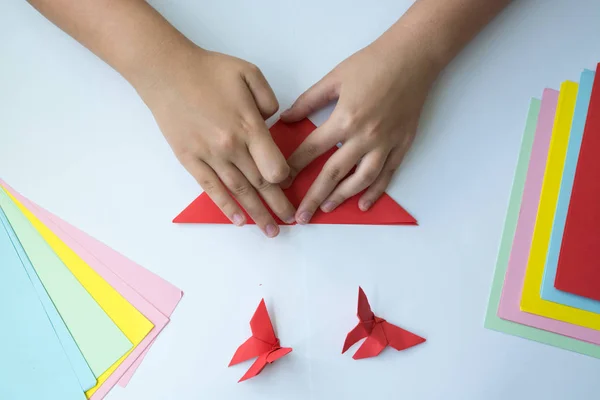 Children's Hands Origami Butterfly Colored Paper White Background ...