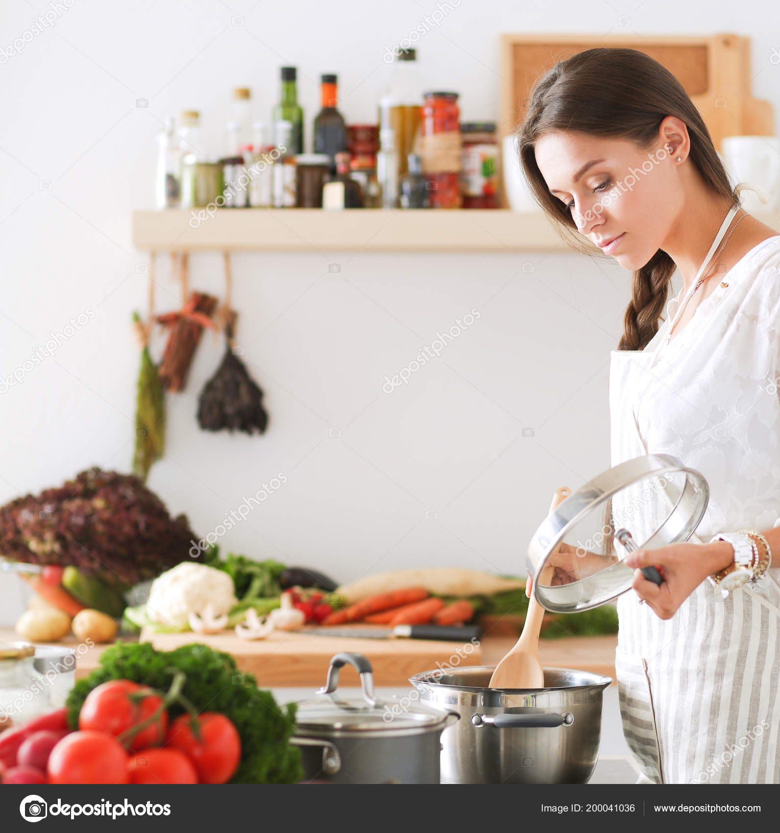 Woman Cooking In The Kitchen