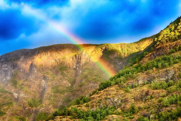 Rainbow over mountains Stock Photos, Royalty Free Rainbow over ...