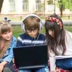 Three Children Study Computer Open Air Pupils Junior School Sitting ...
