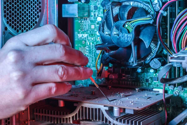 Close-up of professional equipment master repairing computer software ...