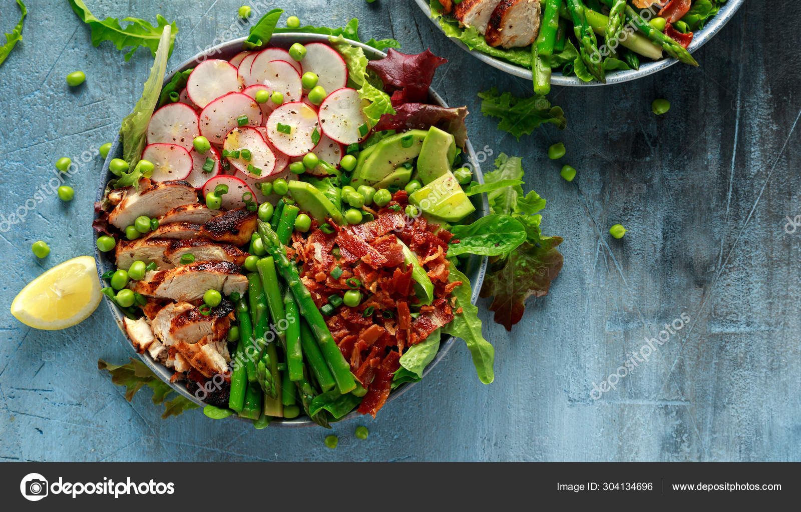 Cobb salad bowl with grilled chicken breast, asparagus, avocado ...