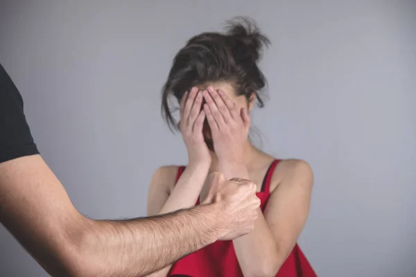 Angry Man Beating Sad Woman Grey Background Stock Photo by ©Aghavni ...