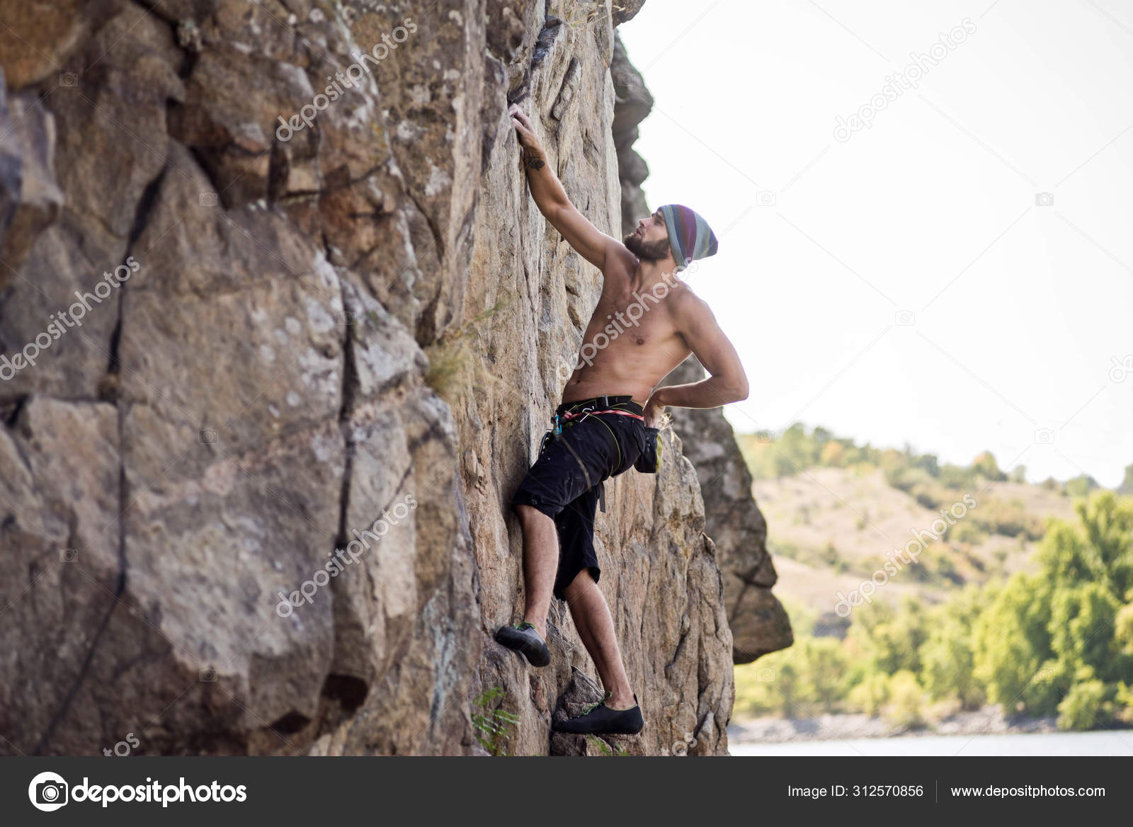Man cliff climber is climbing a rock. Stock Photo by ©mihakonceptcorn ...