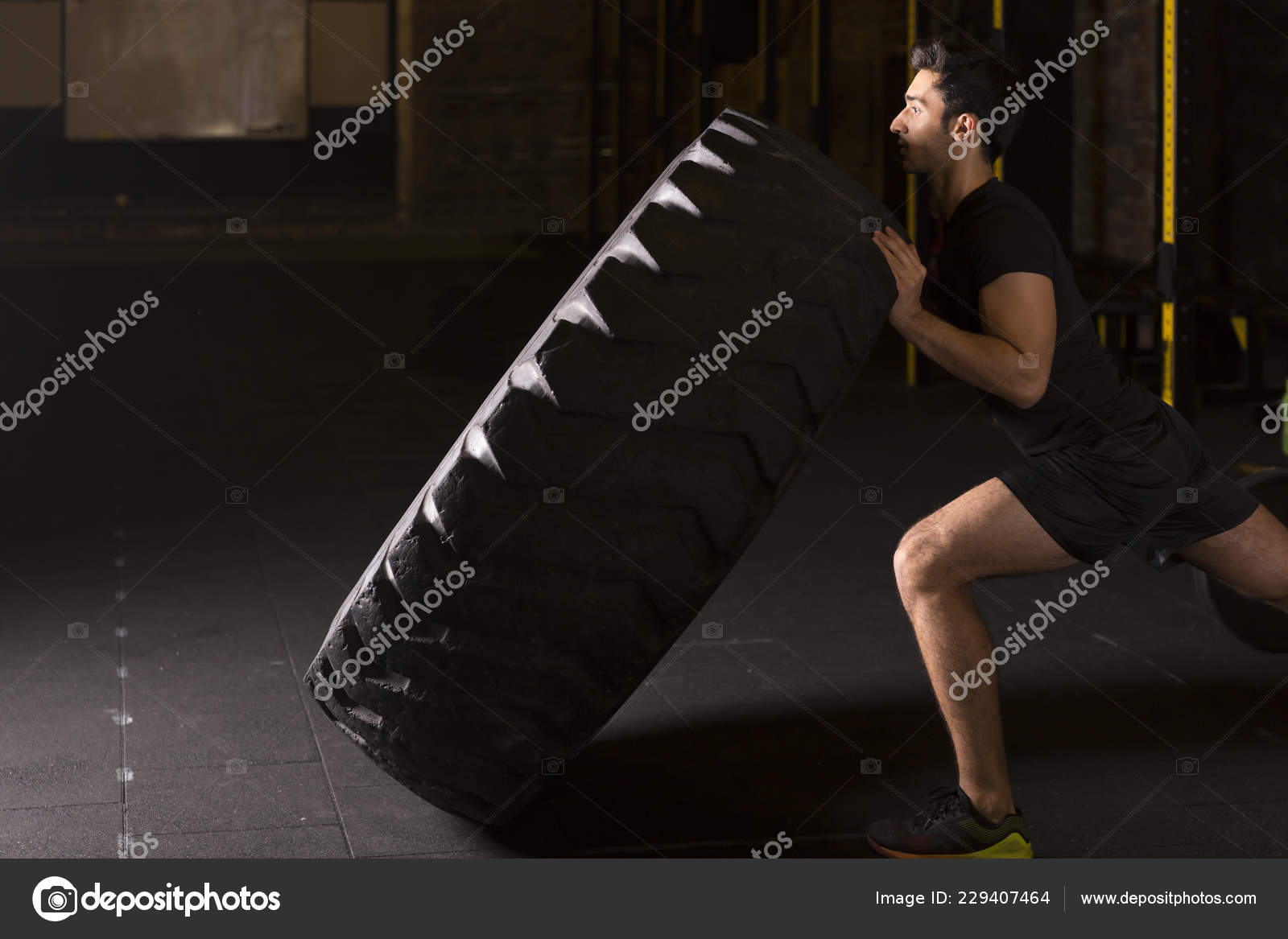 Man Turns Tire Crossfit Functional Sport Young Guy Exercising Wheel ⬇ ...