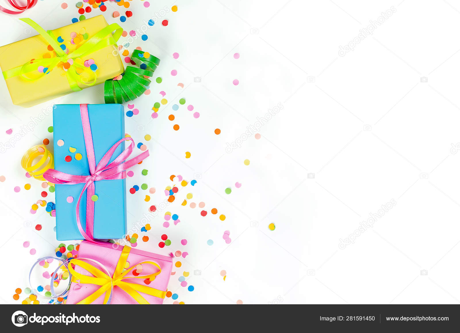 Colorful assorted confetti with serpentine and gift boxes on whi Stock ...