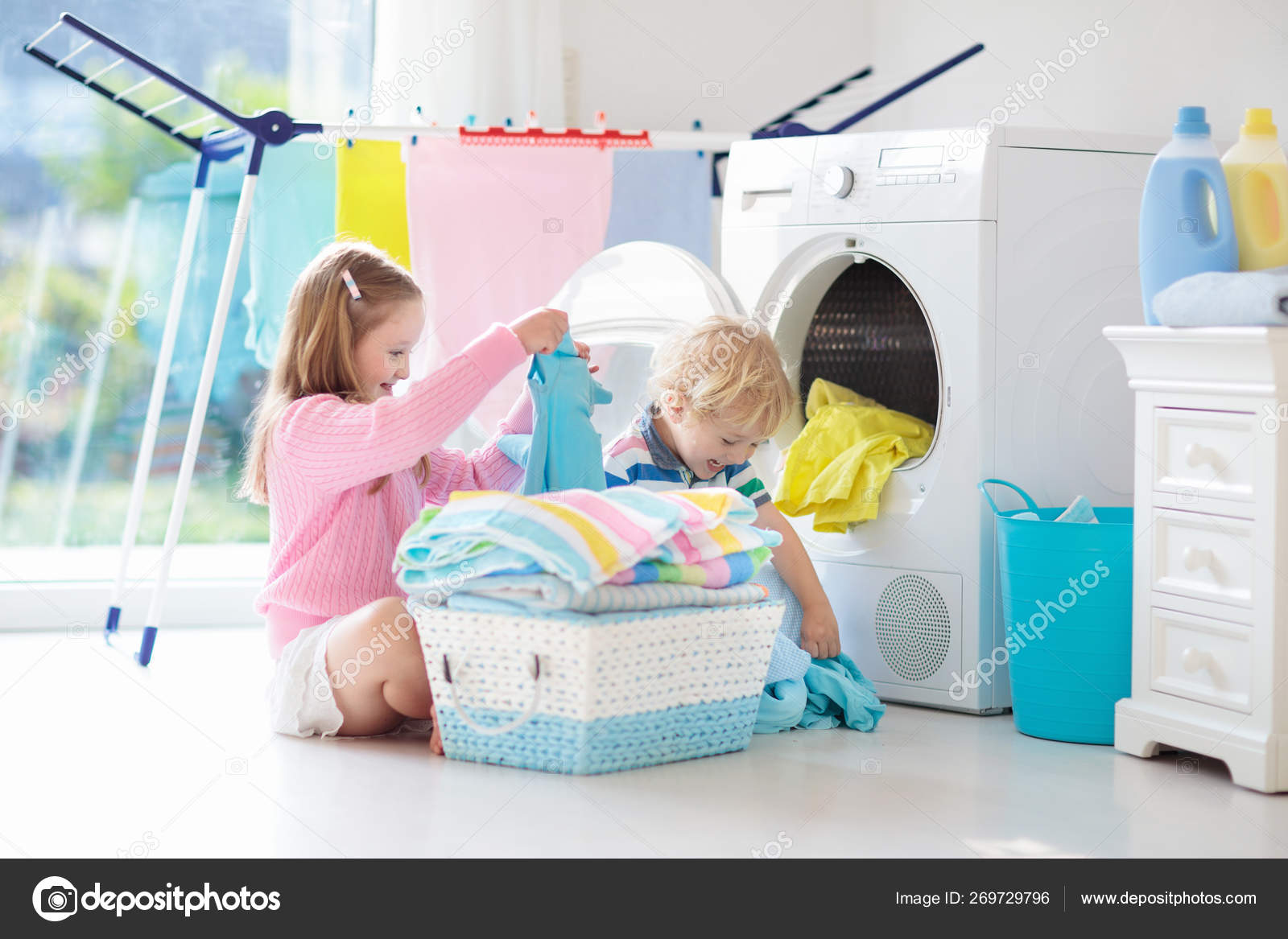 Kids in laundry room with washing machine — Stock Photo © FamVeldman ...
