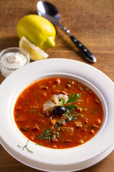 Traditional Russian dish solyanka - thick, spicy and sour saltwort soup ...