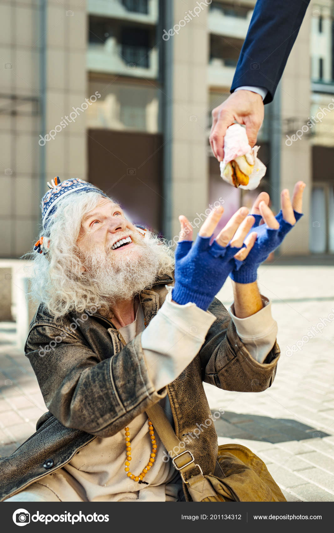 Person Giving Homeless Person Food