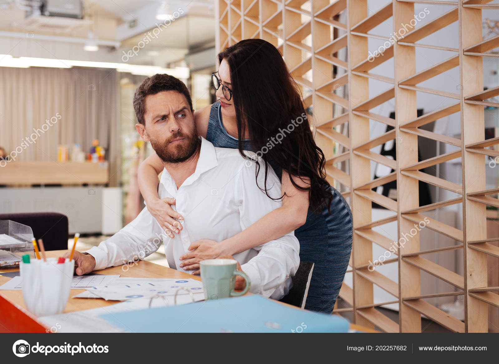 Amorous woman touching her colleagues body — Stock Photo © yacobchuk1 ...