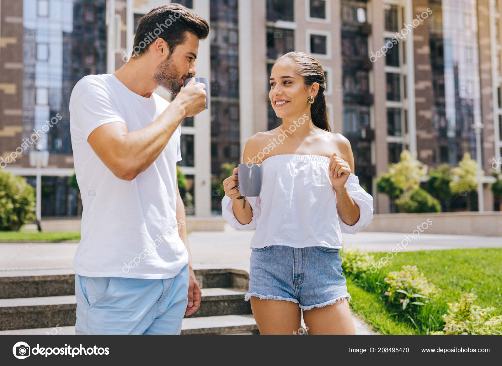 Nice handsome man taking a sip — Stock Photo © yacobchuk1 #208495470
