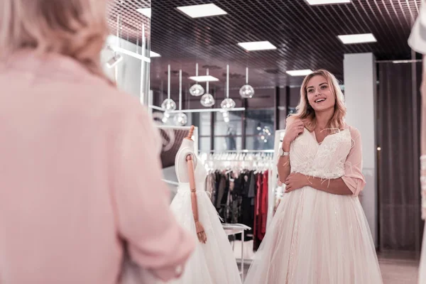 Joyful happy woman looking into the mirror - Stock Image - Everypixel