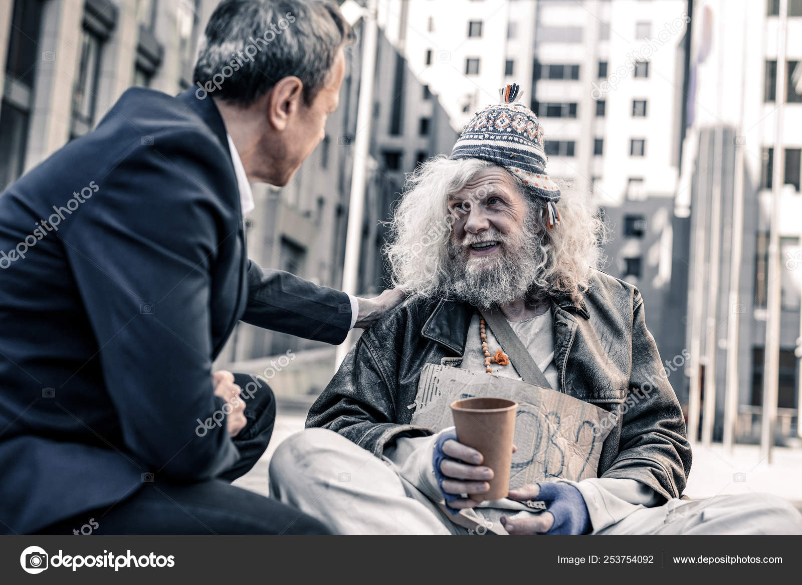 Smiling Homeless Man With Sign
