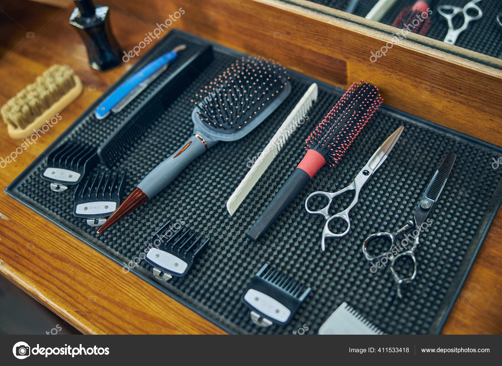 HIgh-quality barbering equipment setup on a table in a barbershop Stock ...