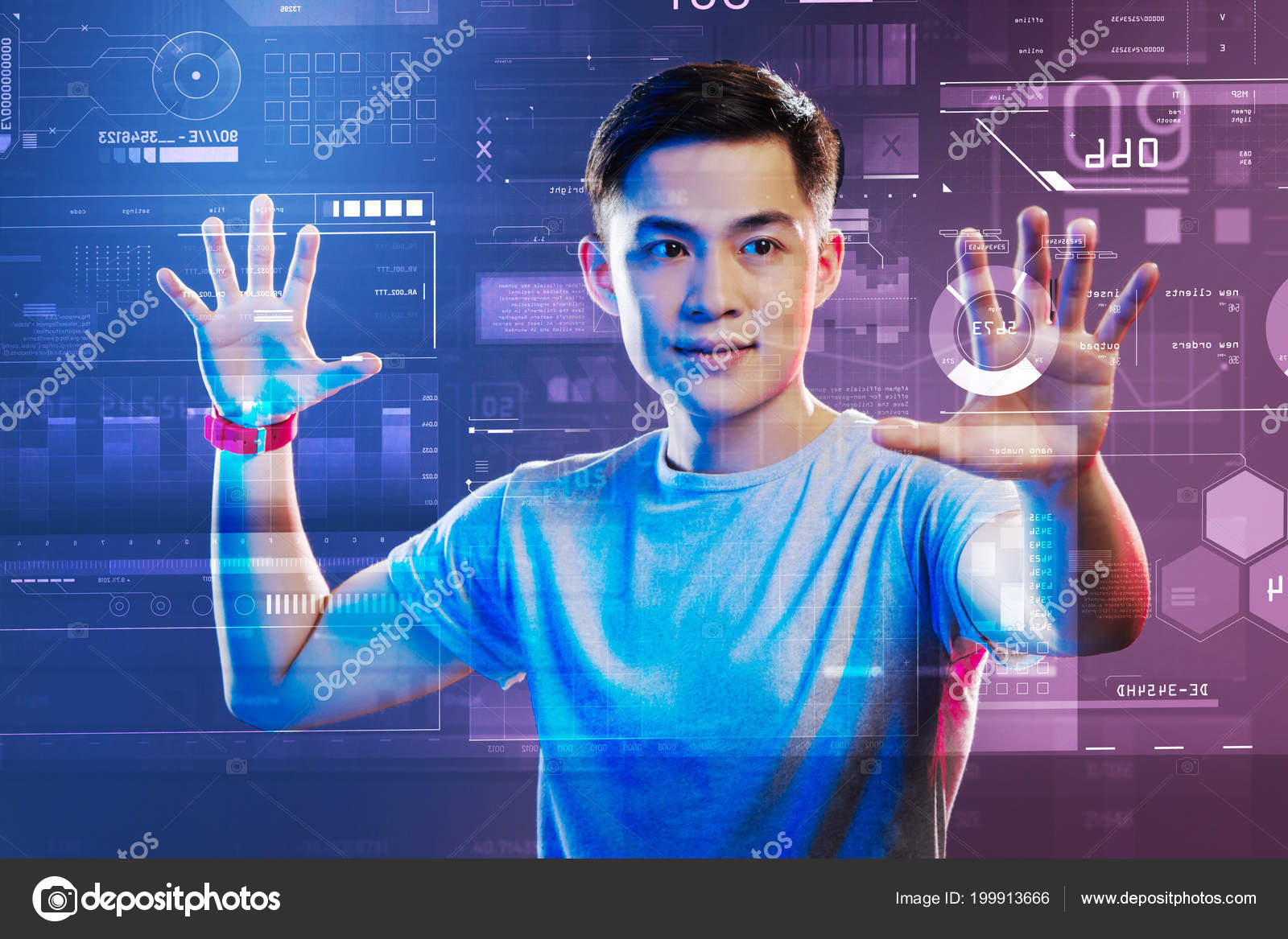 Professional web developer working with holographic images and looking ...