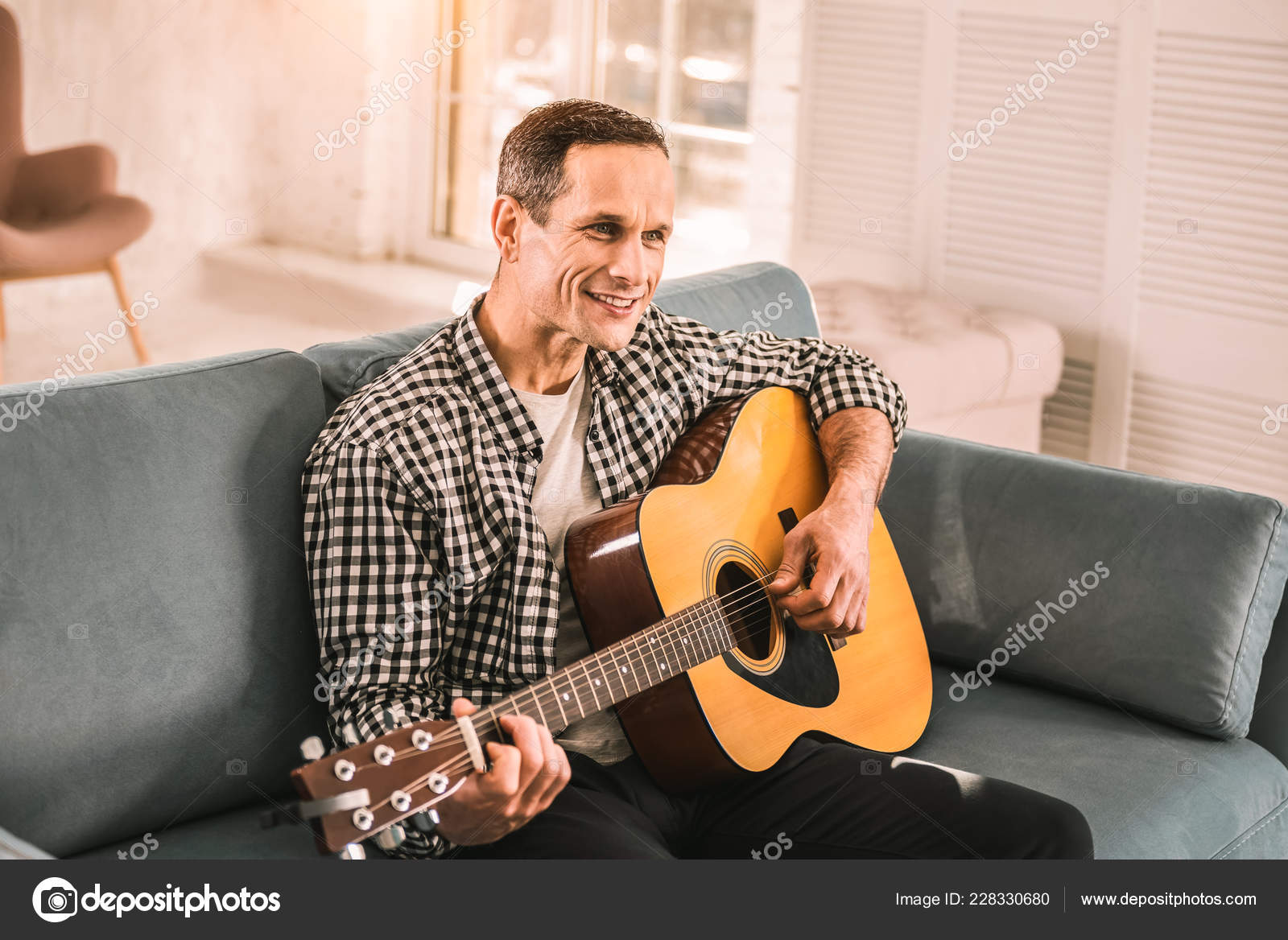 Smiling excited man pursuing the arts in his free time. — Stock Photo ...