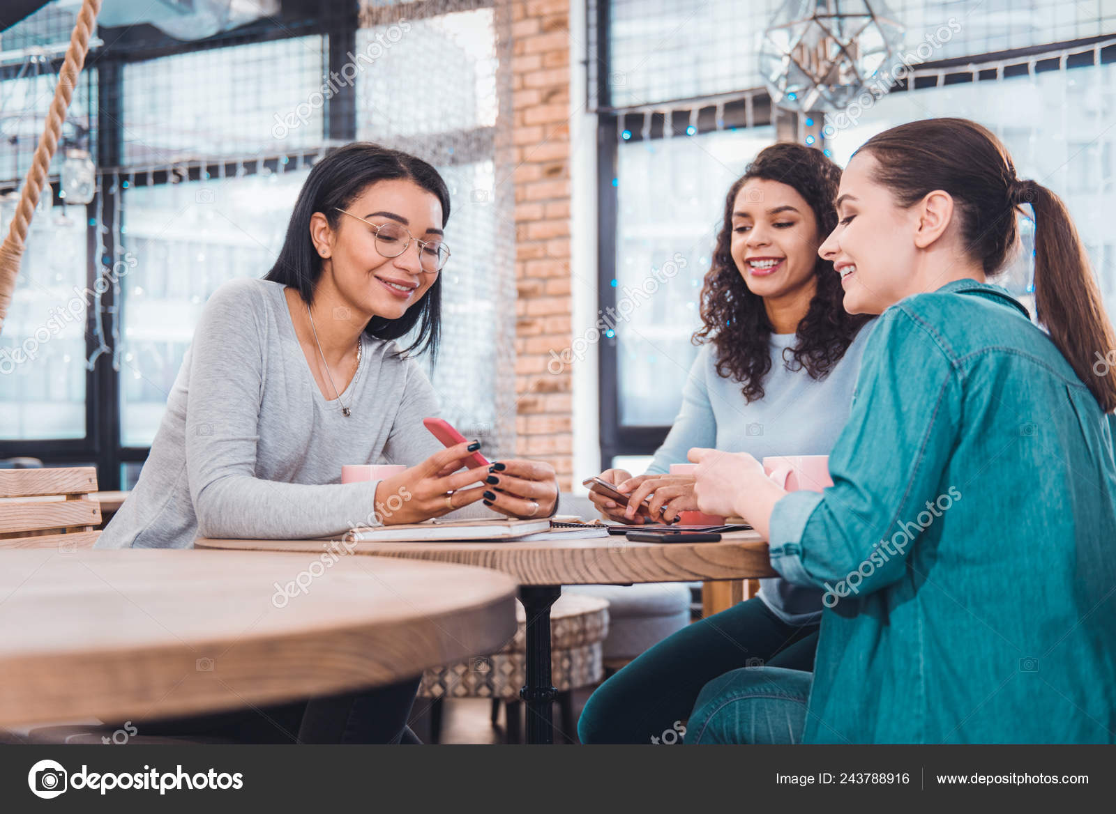 Delighted beautiful woman talking to her friends Stock Photo by ©Dmyrto ...