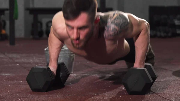 Man trains his bicepses — Stock Photo © kotlyarn #214762160